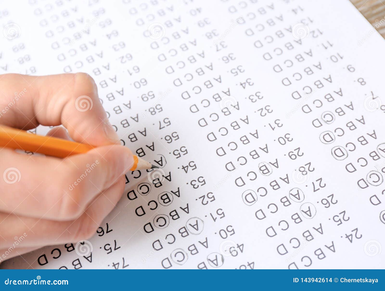 Student Filling Answer Sheet at Table Stock Photo - Image of filling ...