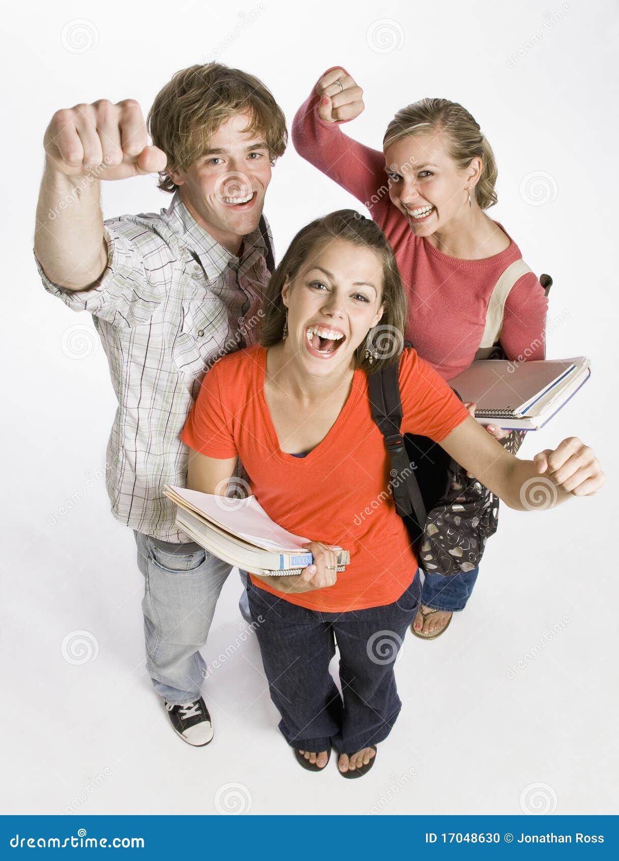 Student friends cheering stock photo. Image of holding - 17048630