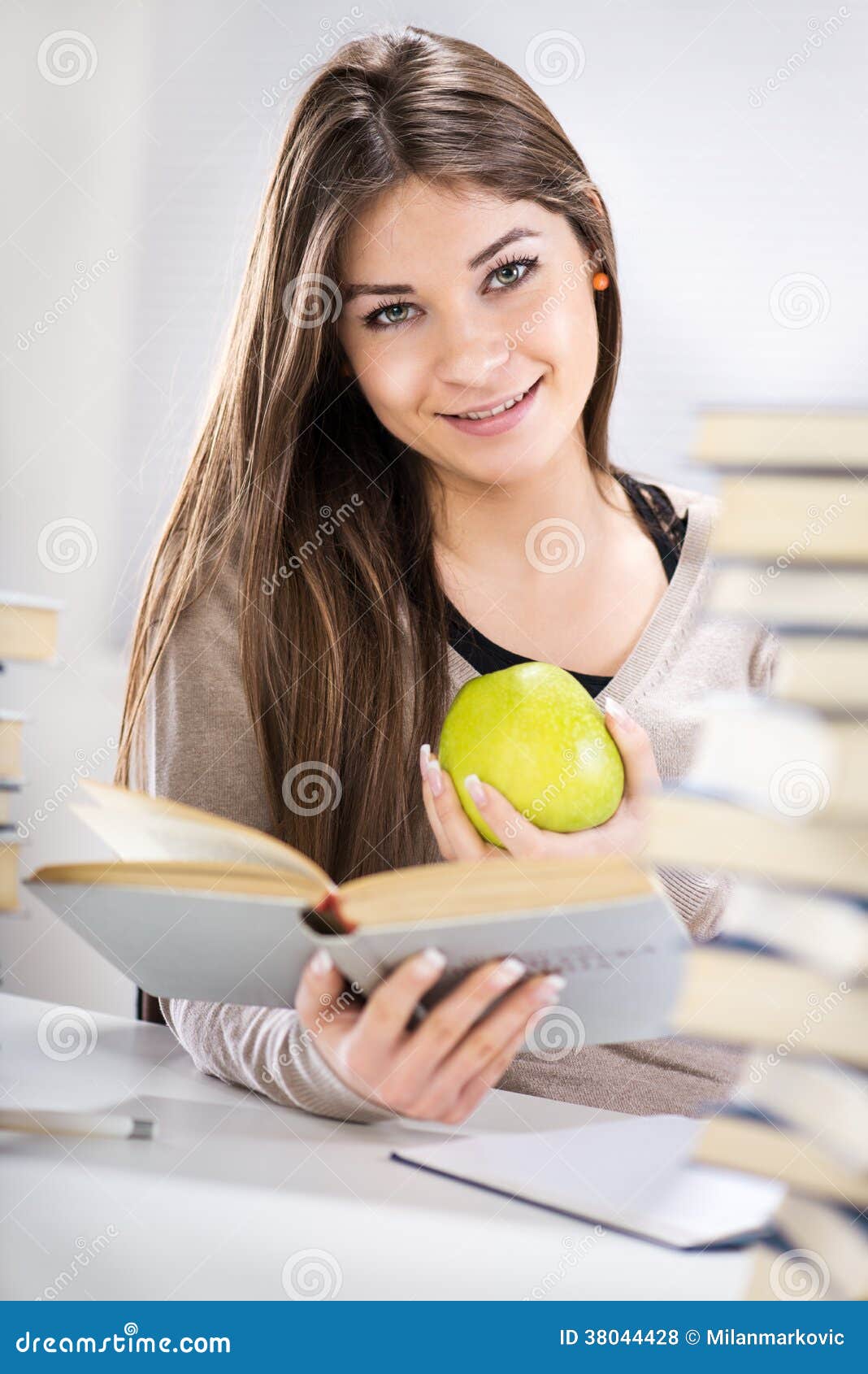 Student girl with Apple stock photo. Image of schooling - 38044428