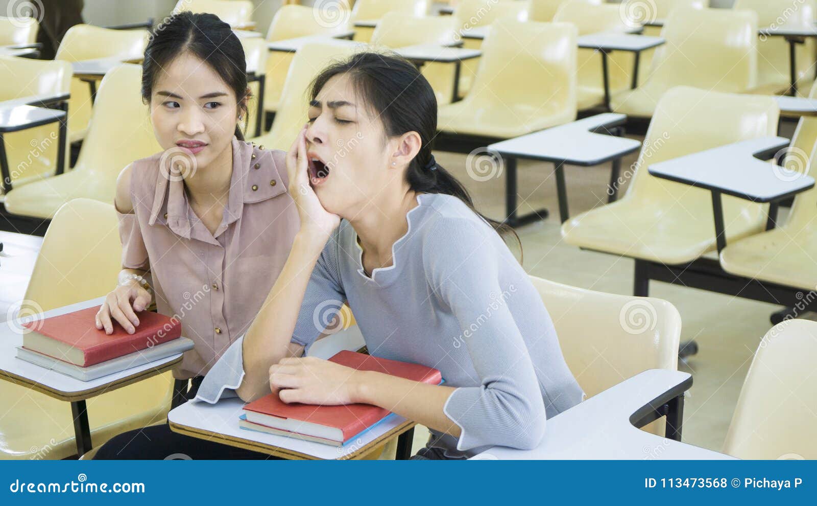 Student Girl Feel Sleepy in the Classroom. Stock Photo - Image of ...