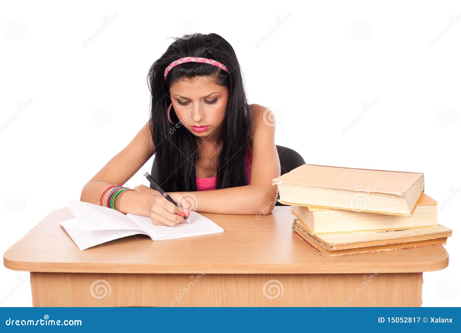 Student girl at her desk stock image. Image of model - 15052817