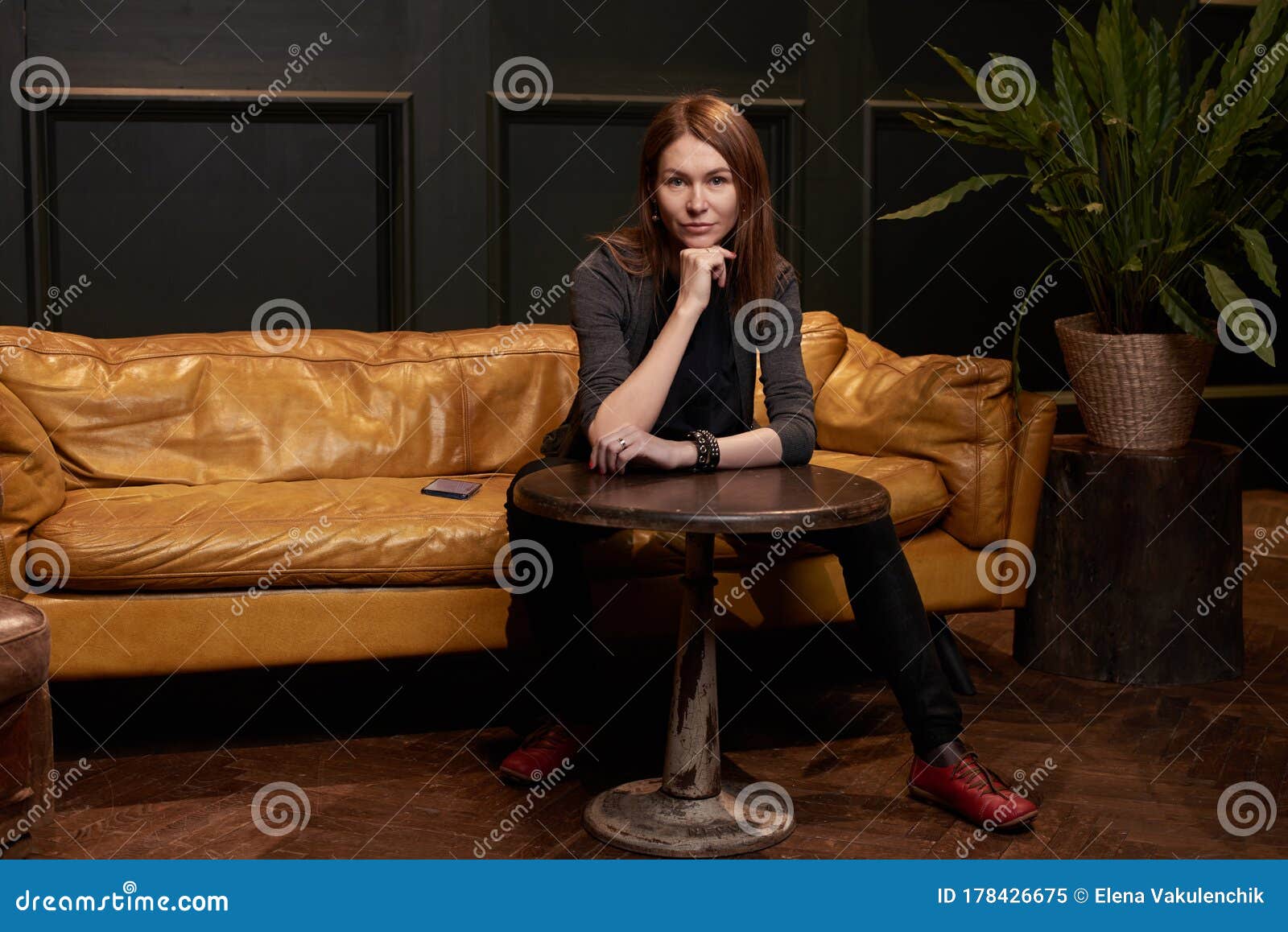 Pretty Girl on the Sofa in Loft Interior Stock Image - Image of jeans ...