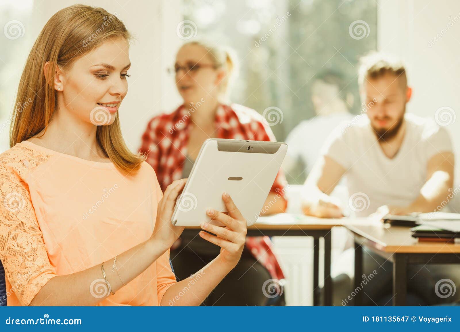 Student Girl with Tablet in Front of Her Classmates Stock Image - Image ...