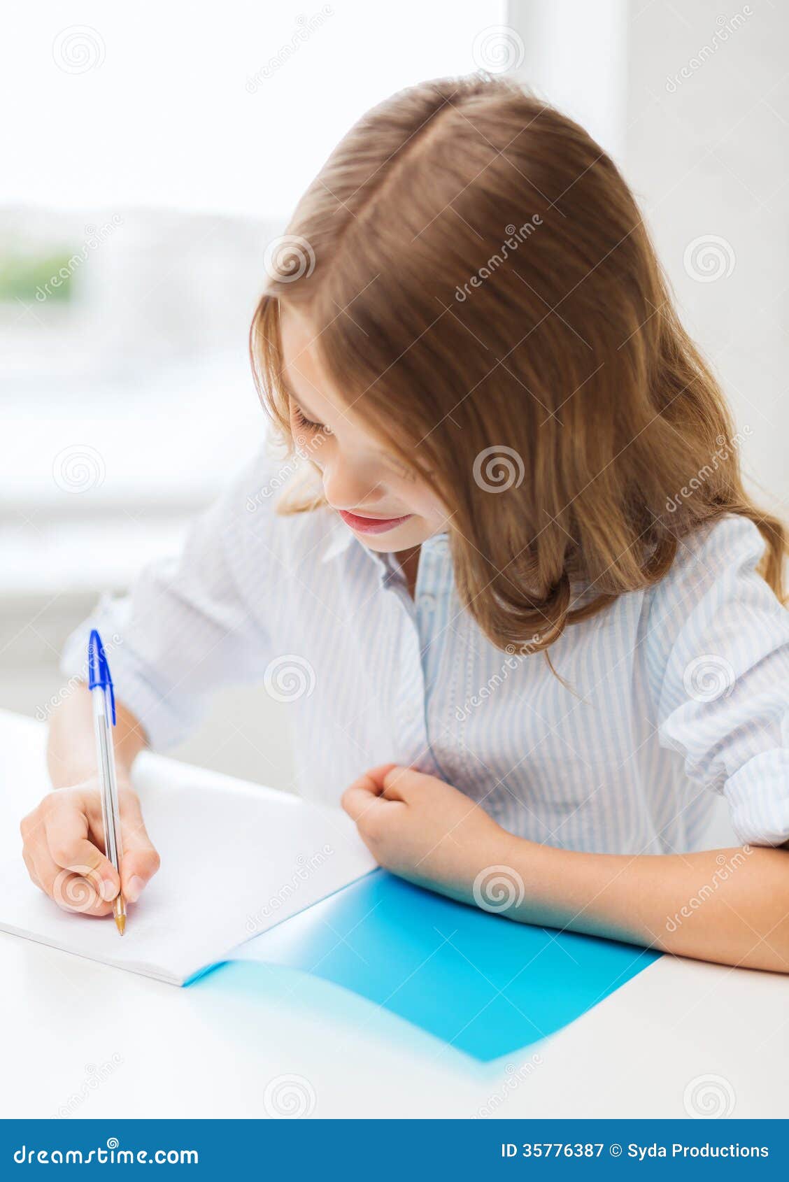 Student Girl Writing in Notebook at School Stock Image - Image of ...