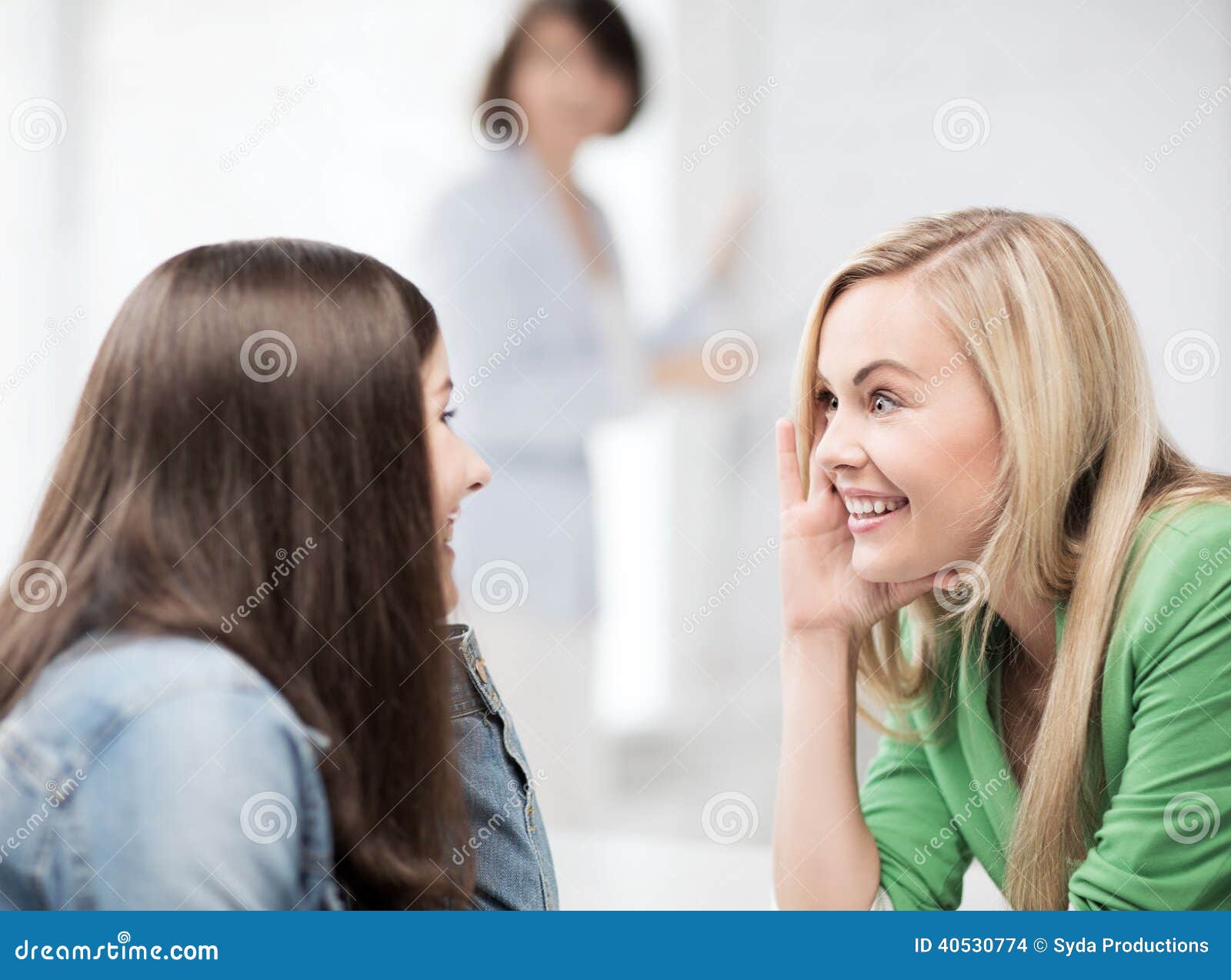 Student Girls Gossiping at School Stock Photo - Image of smiling ...