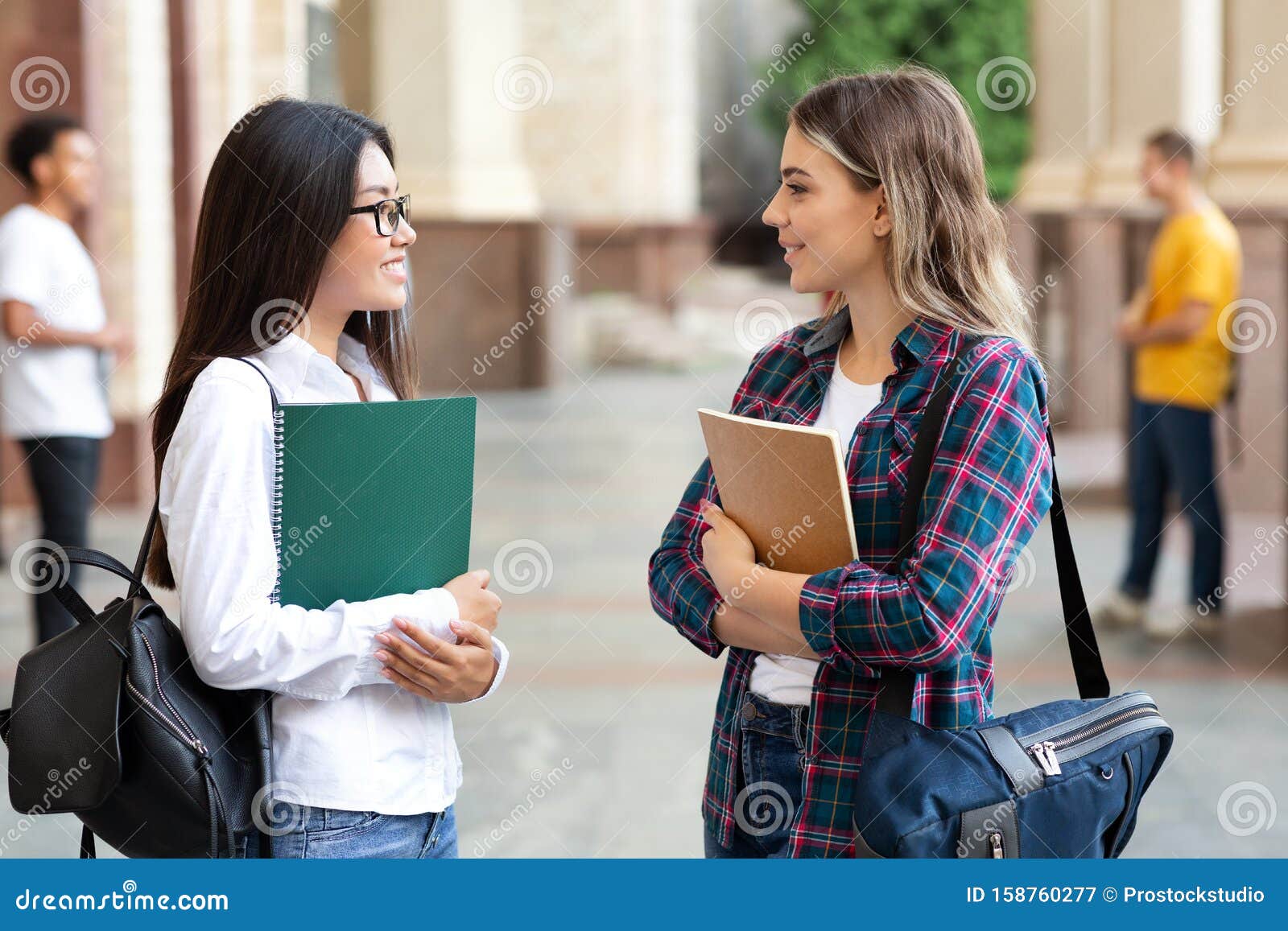Student Girls Resting between Classes and Talking Outdoors Stock Image ...