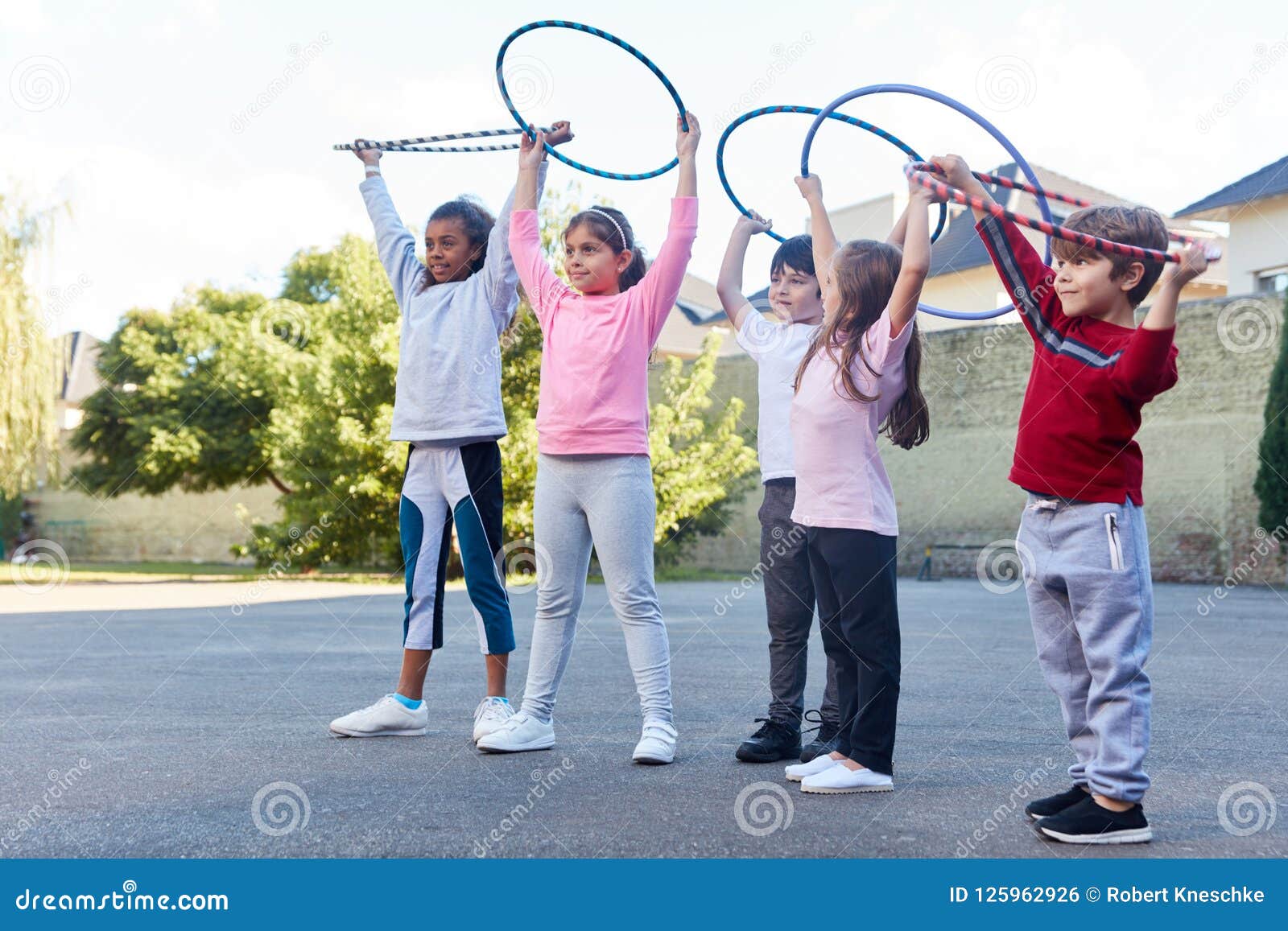Student Group is Doing Exercise with Hoops Stock Photo - Image of ...