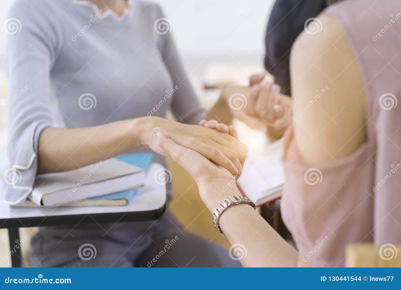 Student Group Holding Hands and Praying before Learning and Educ Stock ...