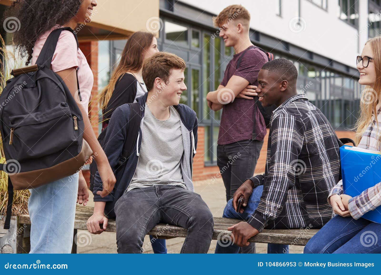 Student Group Socializing Outside College Buildings Stock Image - Image ...