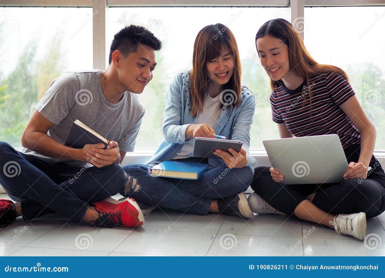 Student Groups are Viewing Information in the Tablet. Having a Gesture ...