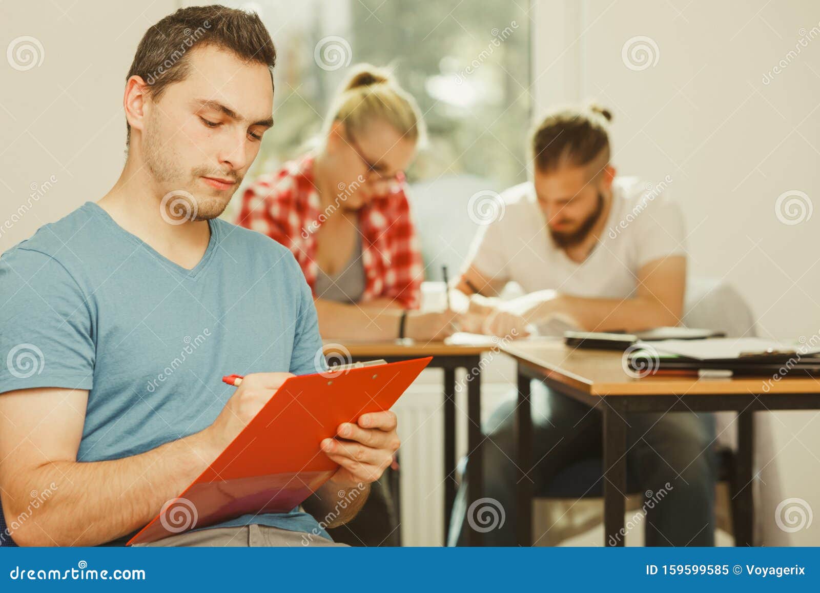 Student Guy in Front of Her Mates in Classroom Stock Image - Image of ...