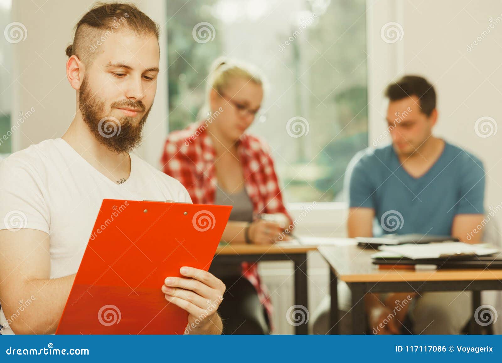 Student Guy in Front of Her Mates in Classroom Stock Photo - Image of ...