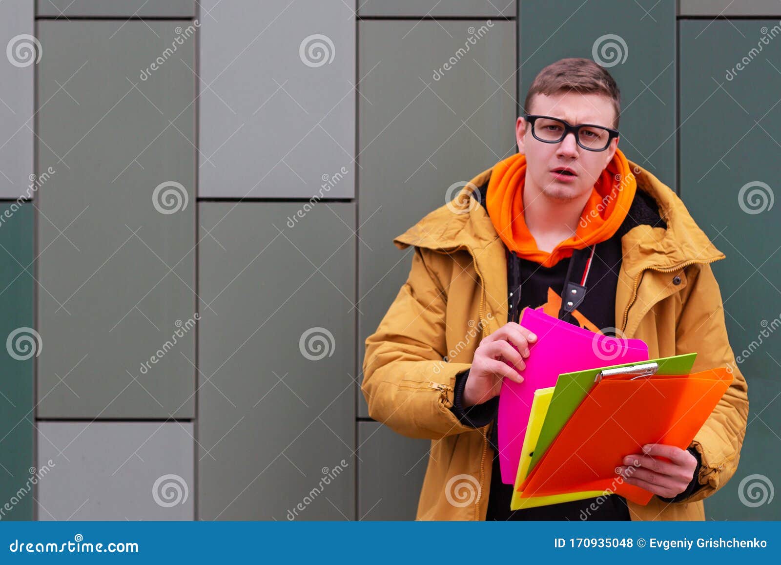 Student Guy Holds Books and Asks Straining Your Brain Stock Photo ...