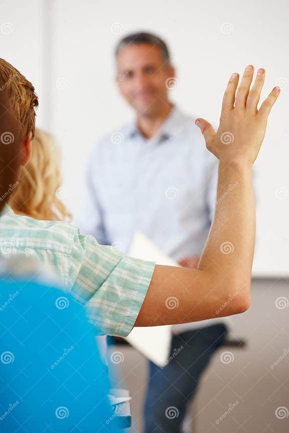 Student with Hand Up in Class Stock Photo - Image of learning ...