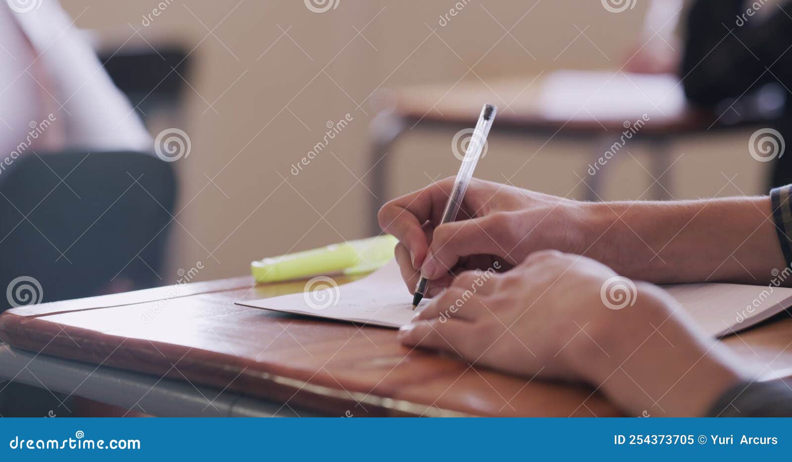 Student Hands Writing and Learning in Classroom Book or Notebook for ...