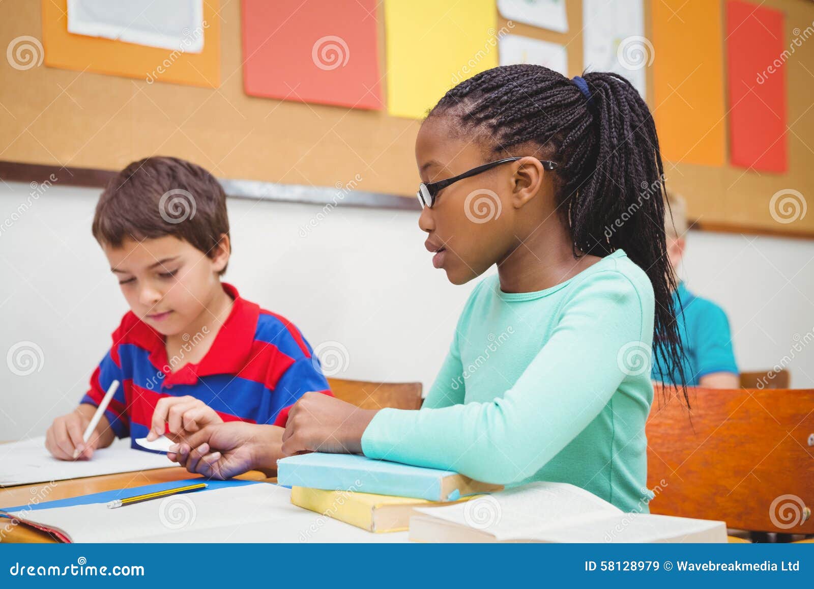 Student Helping Fellow Student in Class Stock Image - Image of desk ...