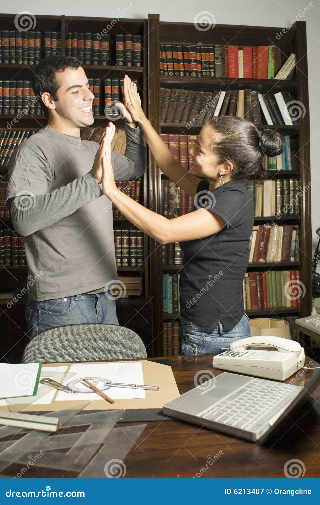 Student High Fiving - Vertical Stock Image - Image of office, female ...