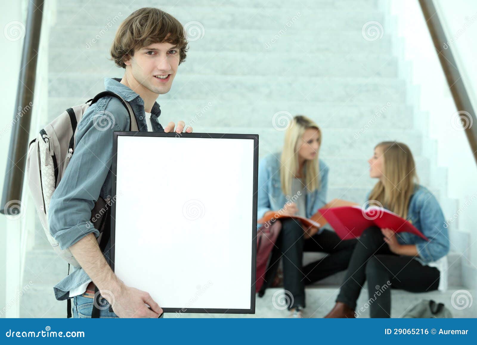 Student Holding Blank Poster Stock Photo - Image of space, poster: 29065216