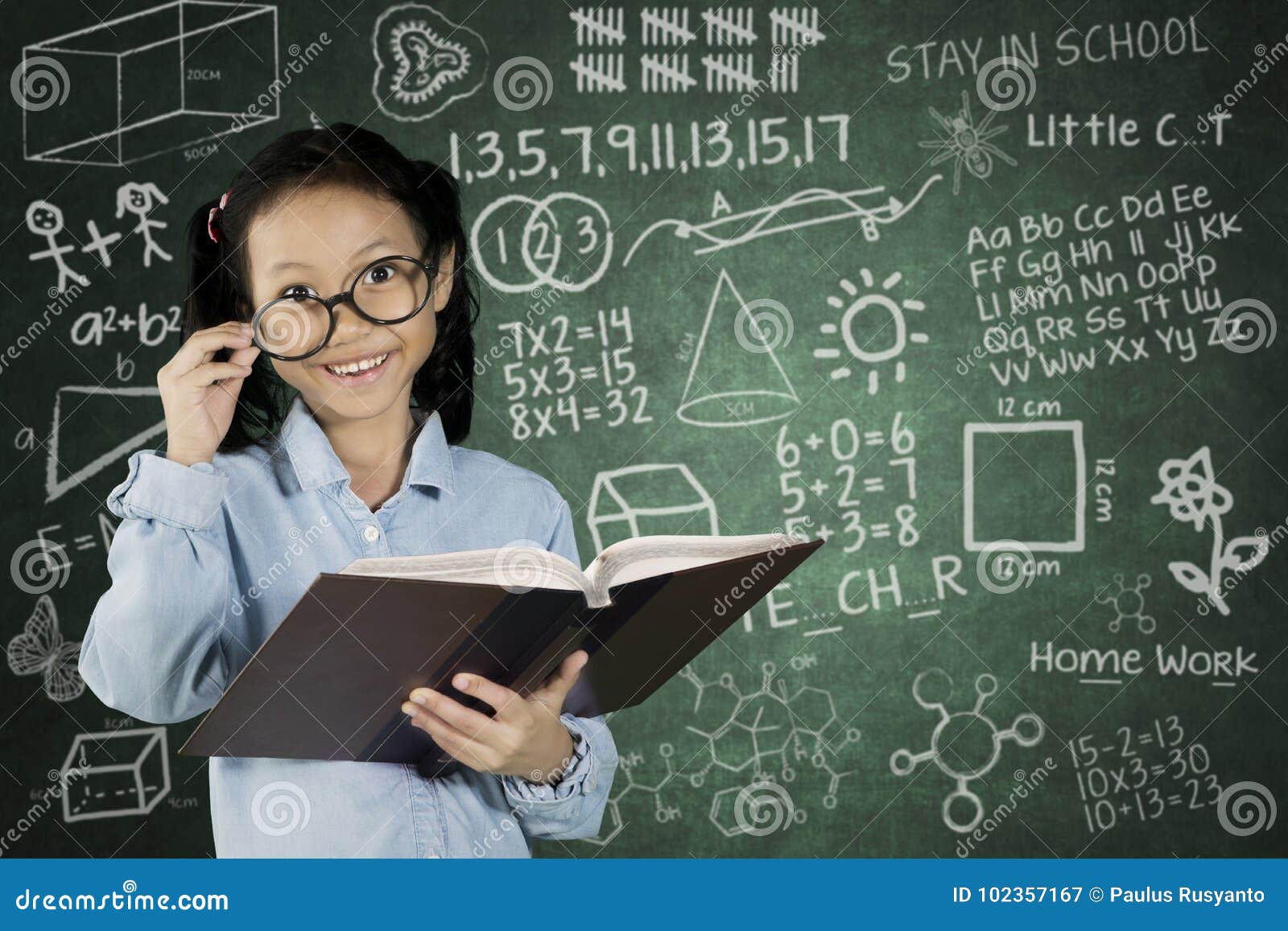 Student Holding Book with Scribble on Chalkboard Stock Image - Image of ...