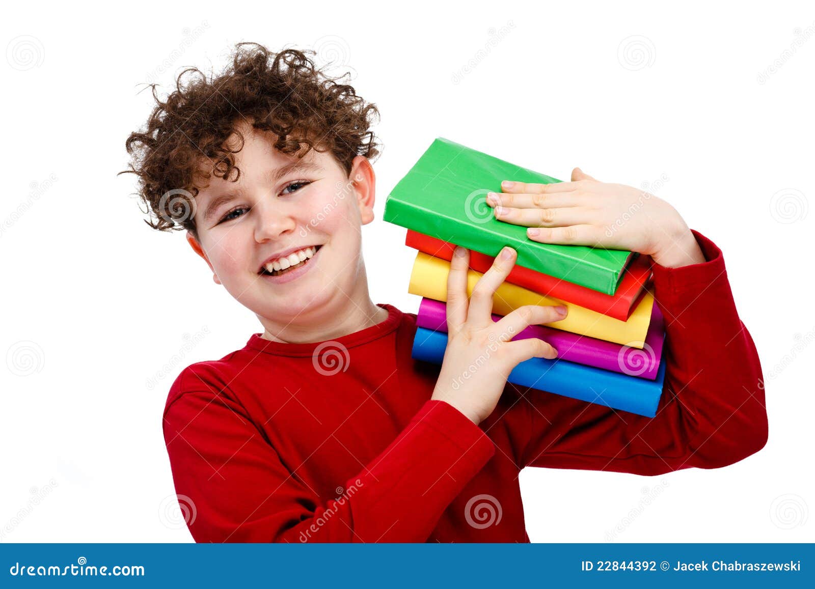Student holding books stock photo. Image of childhood - 22844392