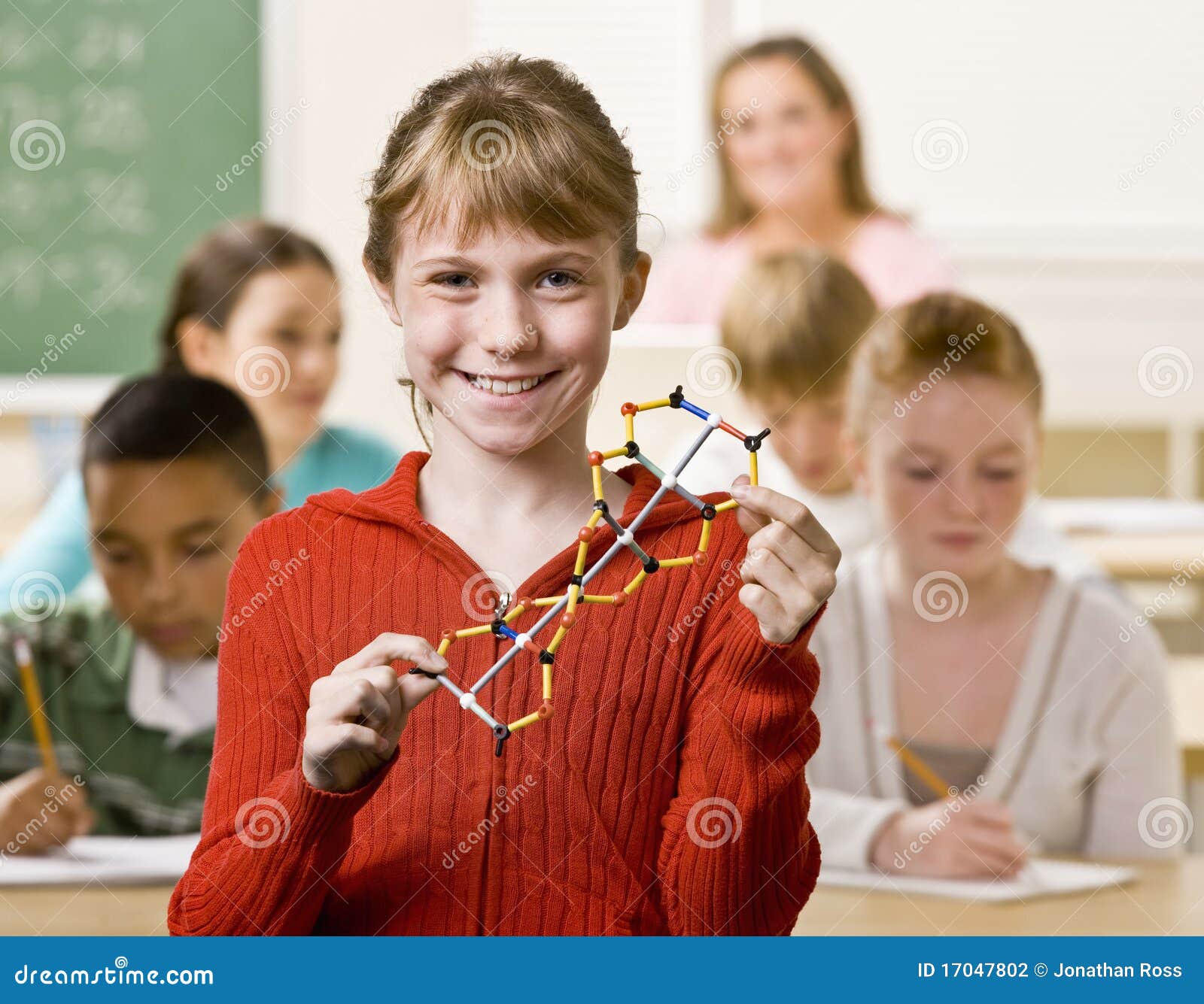 Student Holding Helix in Classroom Stock Photo - Image of person ...