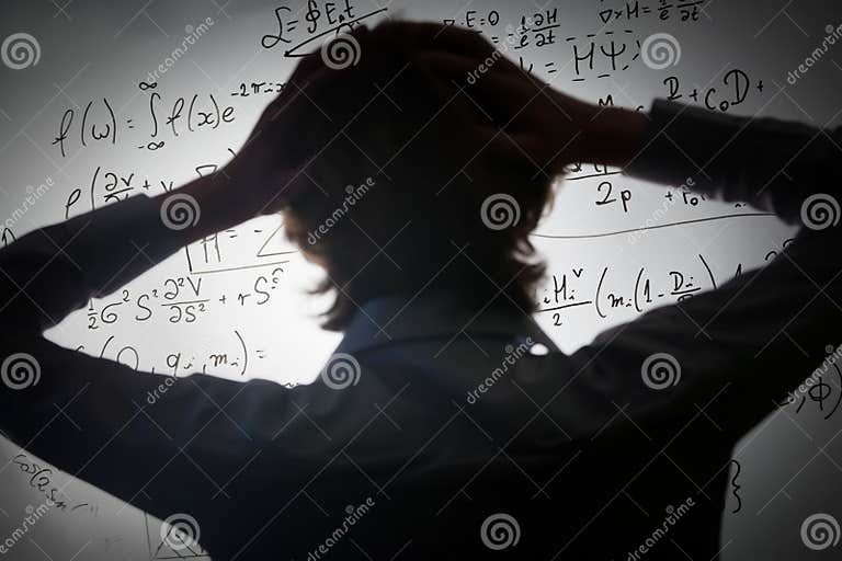 Student Holding His Head Looking at Complex Math Formulas on Whiteboard ...