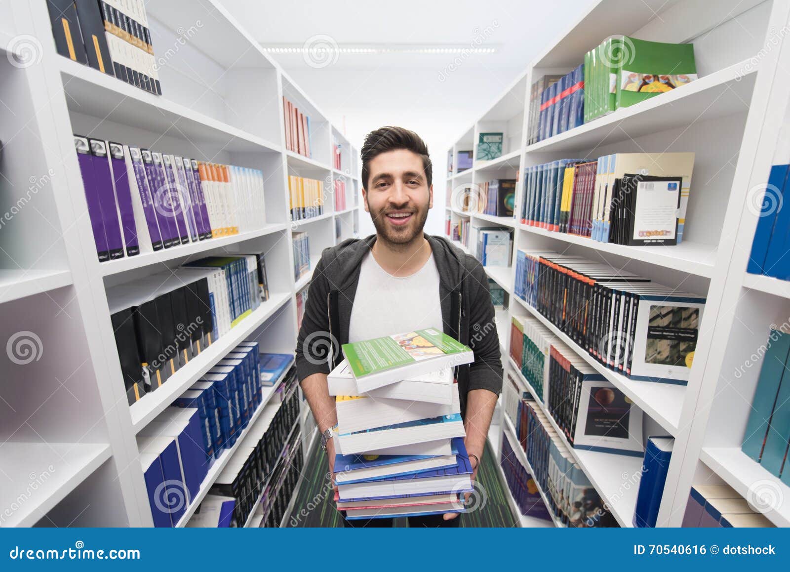 Student Holding Lot of Books in School Library Stock Photo - Image of ...