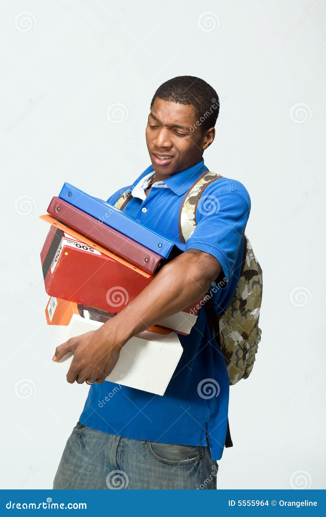 Student Holding Notebooks - Vertical Picture. Image: 5555964