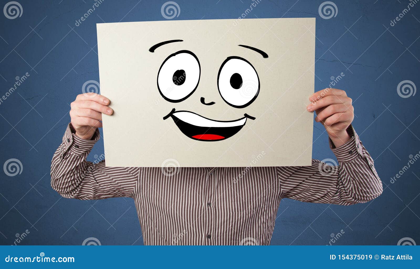 Student Holding a Paper with Laughing Emoticon in Front of His Face ...