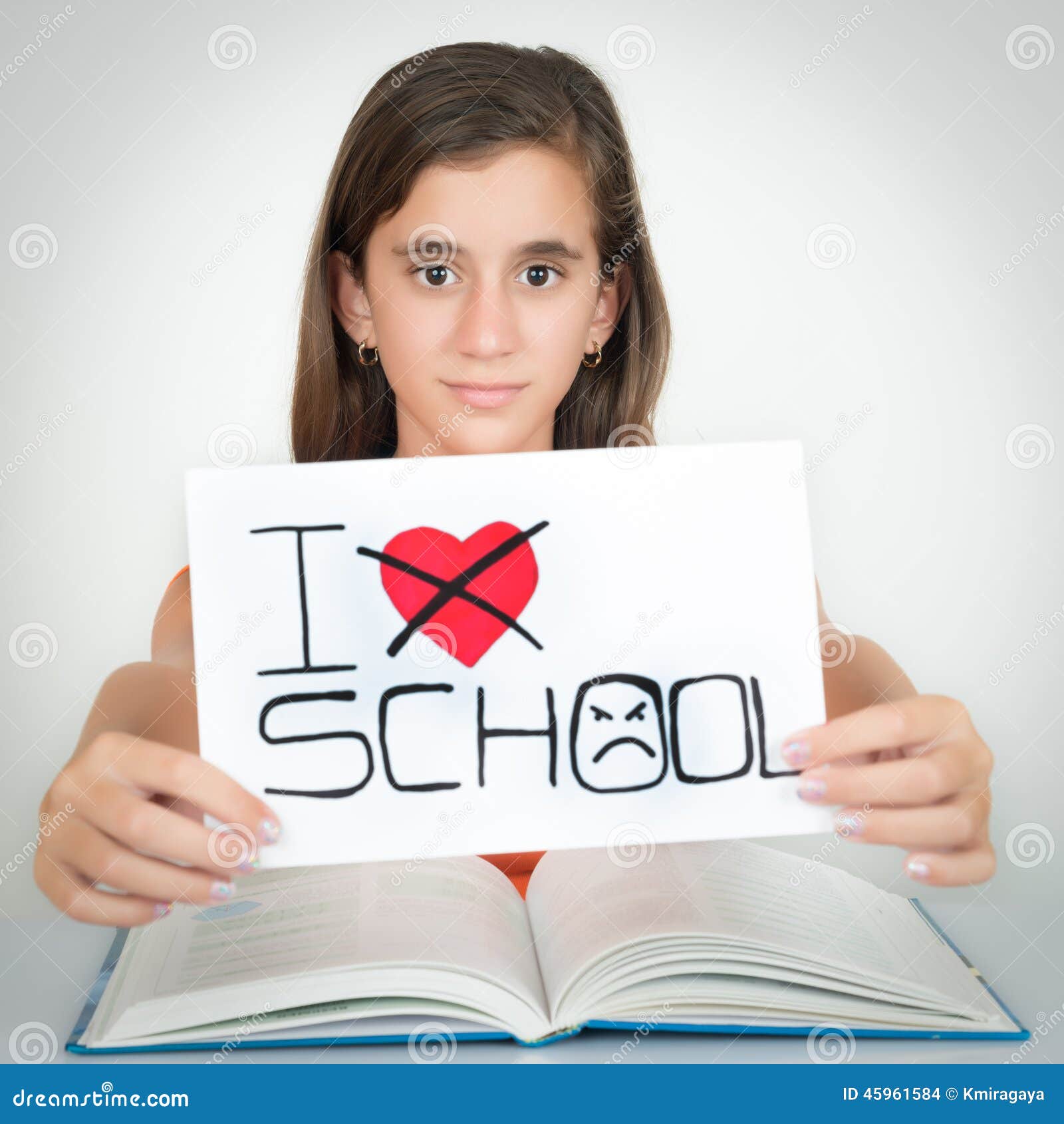 Student Holding A Sign With The Words I Hate School Stock Photo ...