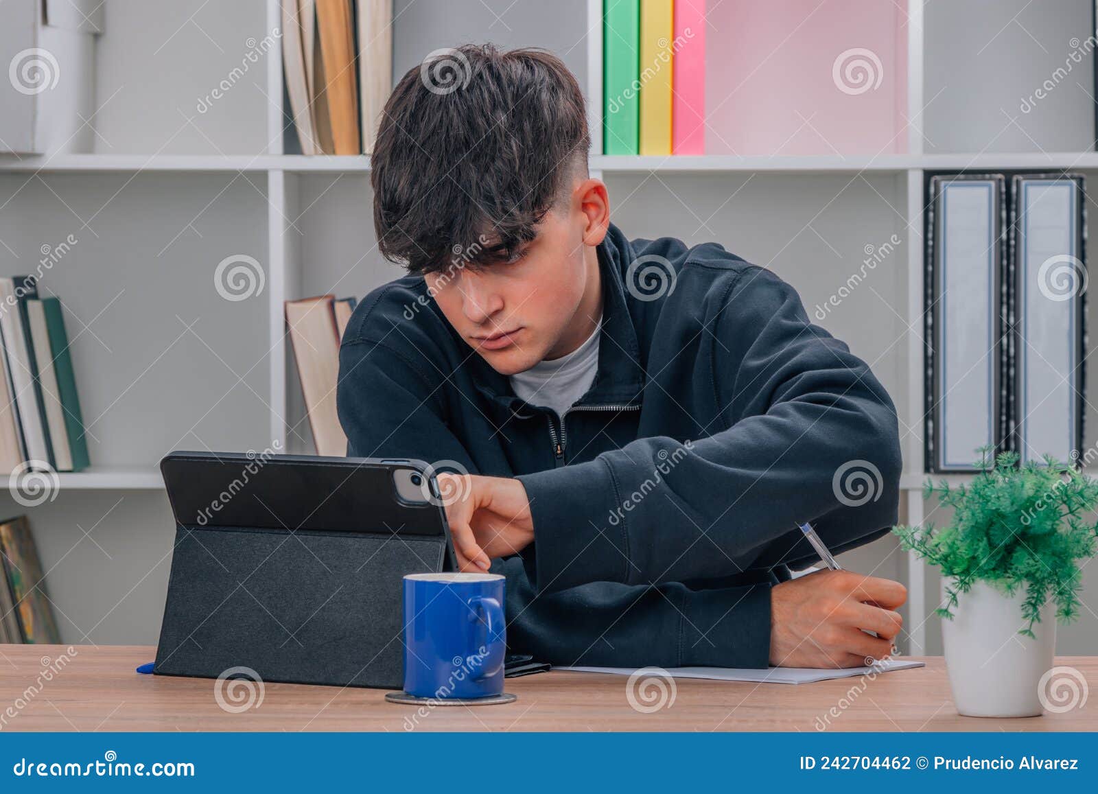 Teen Boy at Home Studying with Computer Stock Photo - Image of ...