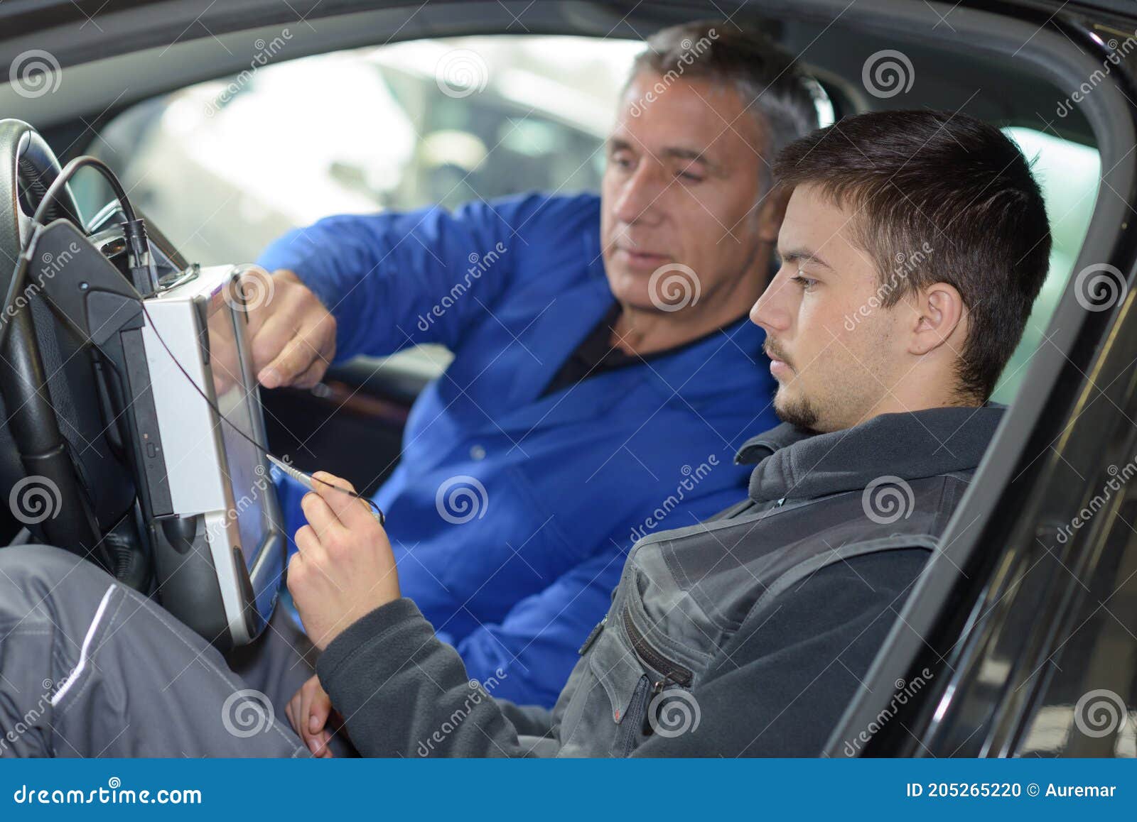 Student with Instructor Repairing Car during Apprenticeship Stock Photo ...