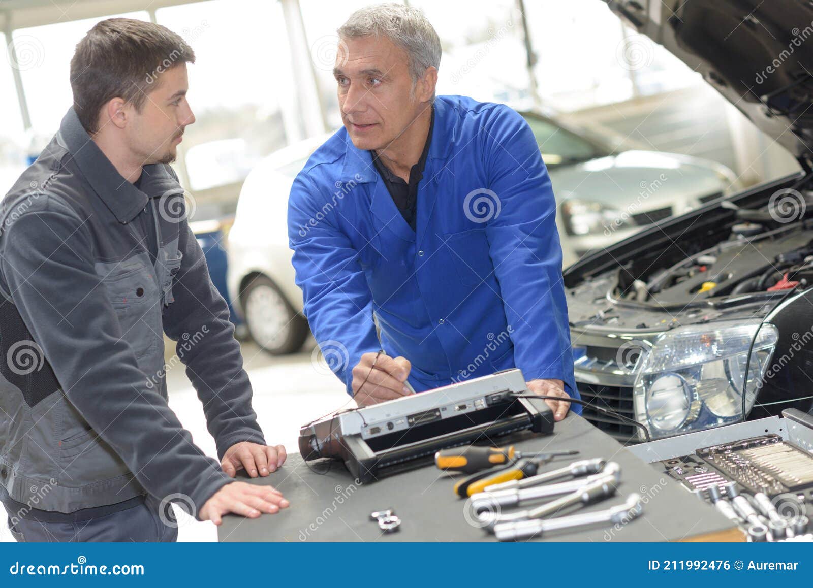 Student with Instructor Repairing Car during Apprenticeship Stock Photo ...
