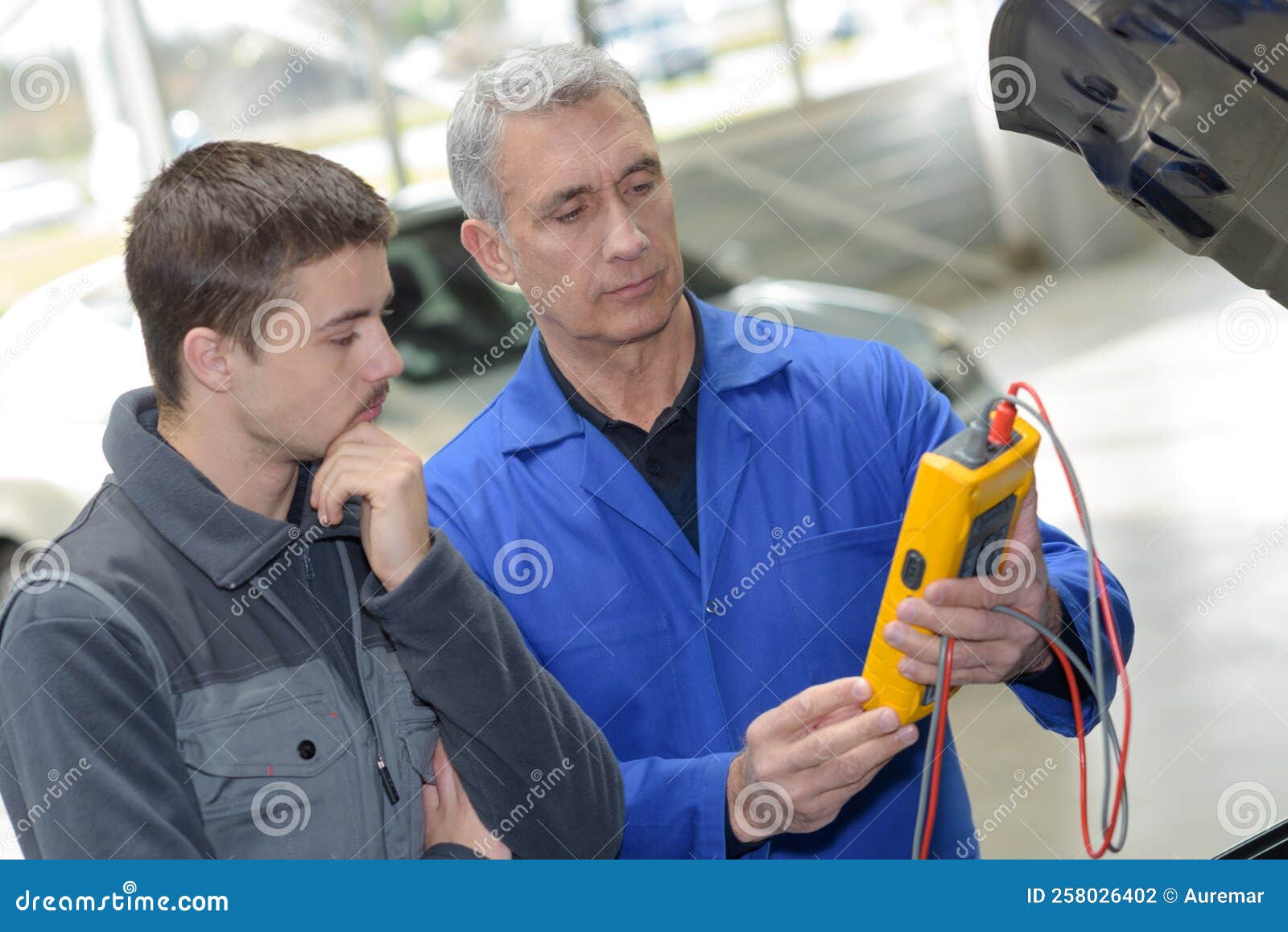 Student with Instructor Repairing Car during Apprenticeship Stock Photo ...