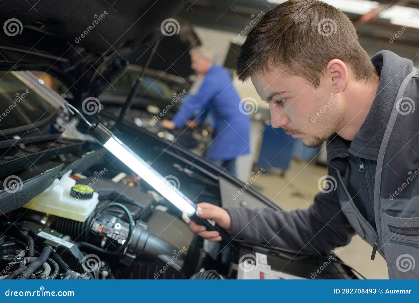 Student with Instructor Repairing Car during Apprenticeship Stock Image ...