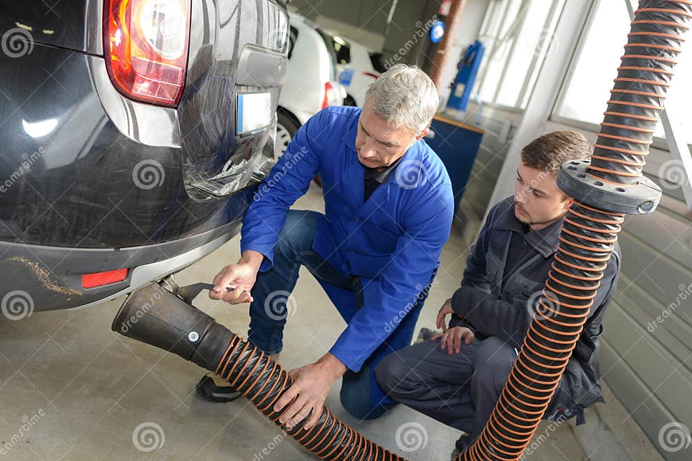 Student with Instructor Repairing Car during Apprenticeship Stock Photo ...