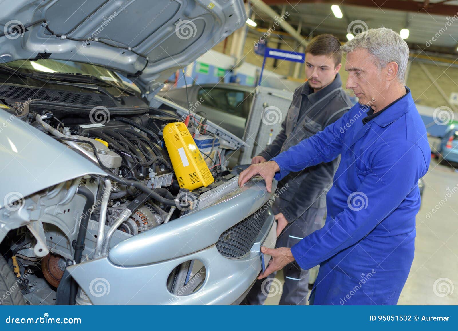 Student with Instructor Repairing Car during Apprenticeship Stock Photo ...