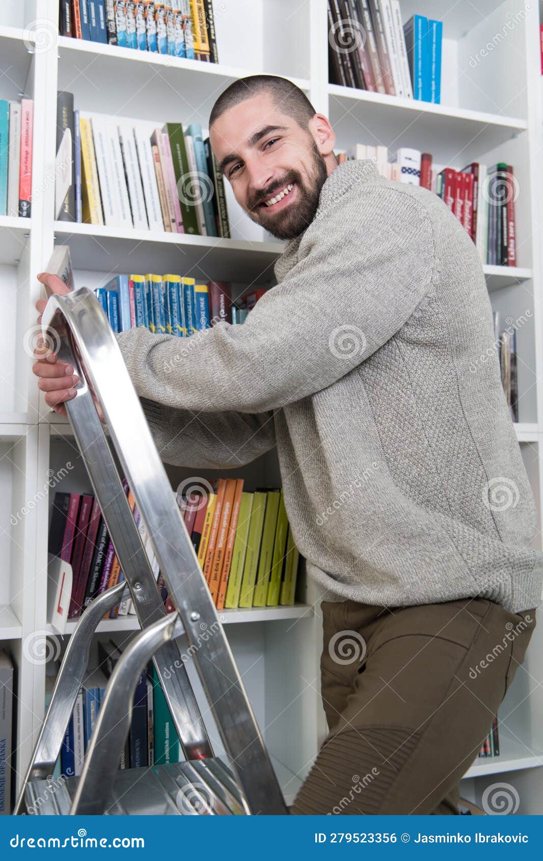 Student on Ladder in Library Stock Photo - Image of presentation ...