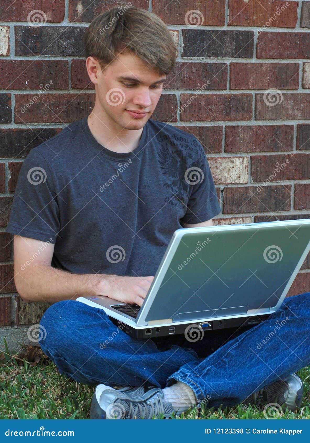 Student on a Laptop stock photo. Image of computer, brick - 12123398