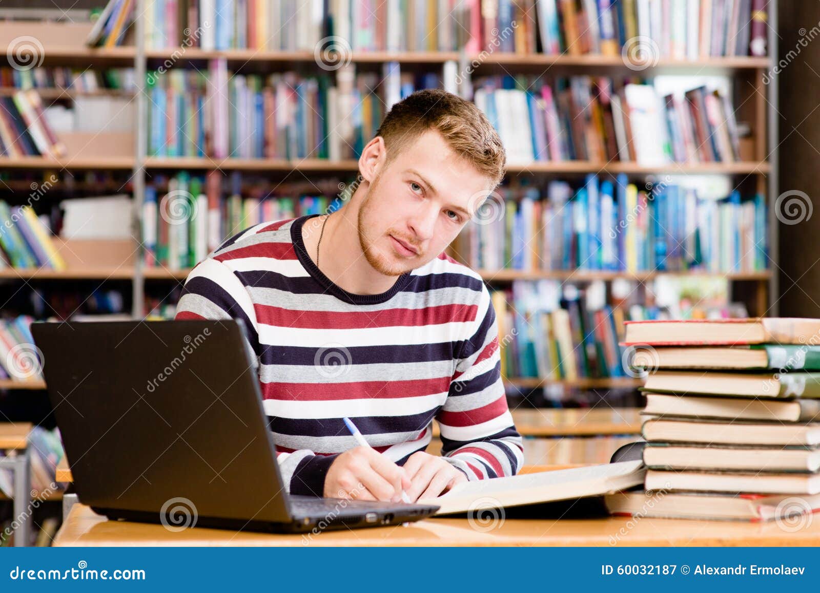 Student with Laptop Studying in the University Library Stock Image ...