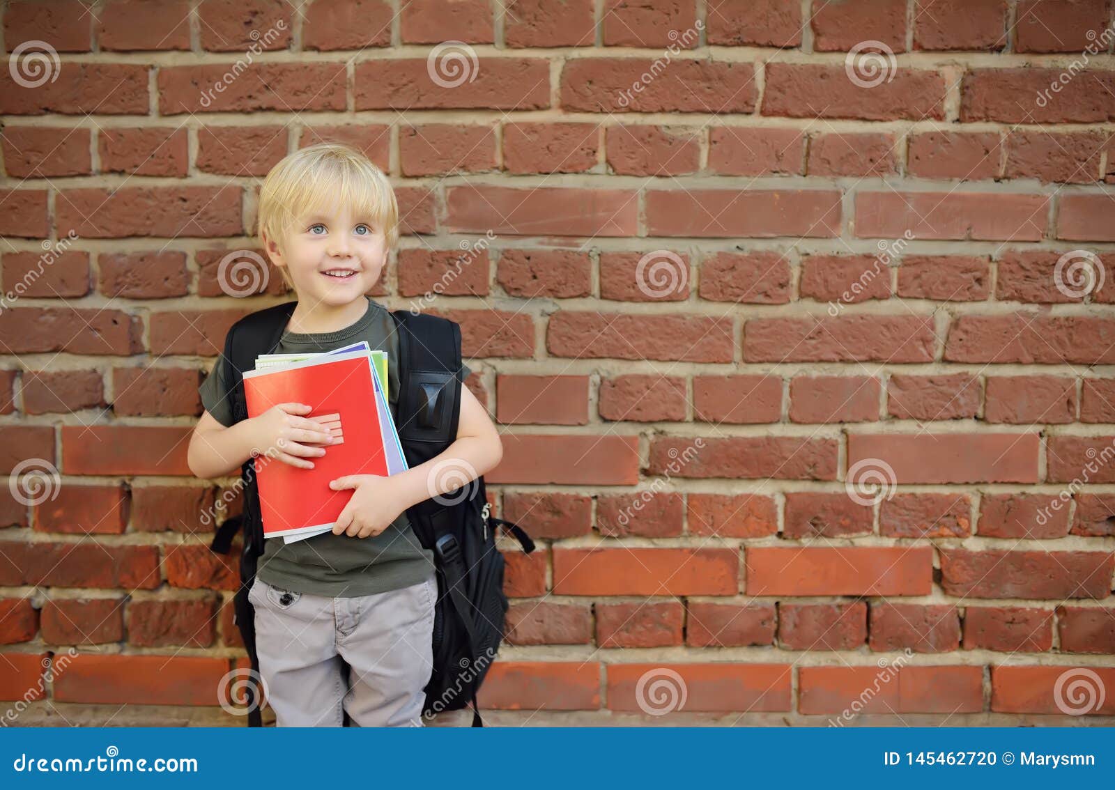 Student with Large Backpack Near the School Building. Back To School ...