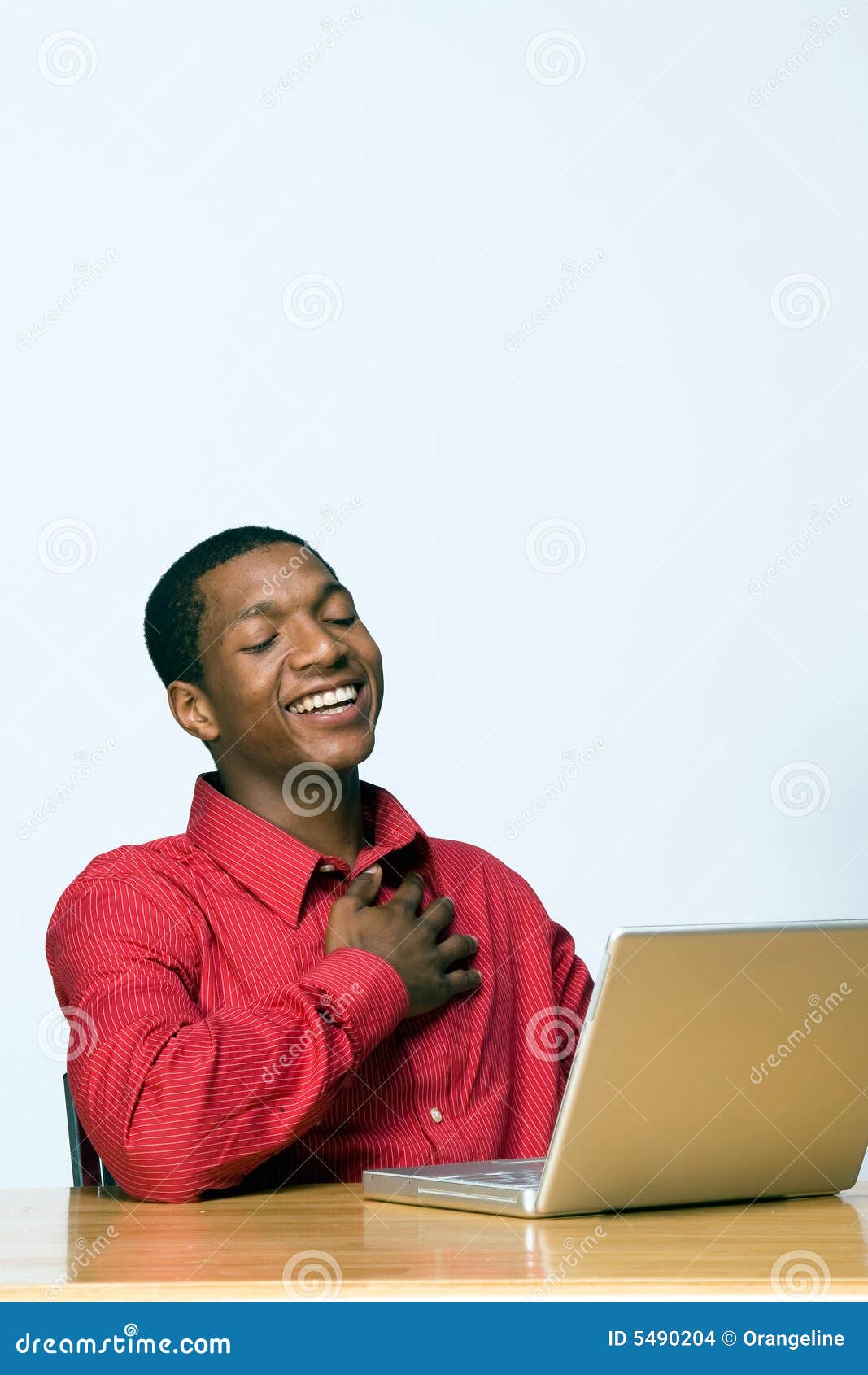 Student Laughing at Laptop - Vertical Stock Photo - Image of playing ...