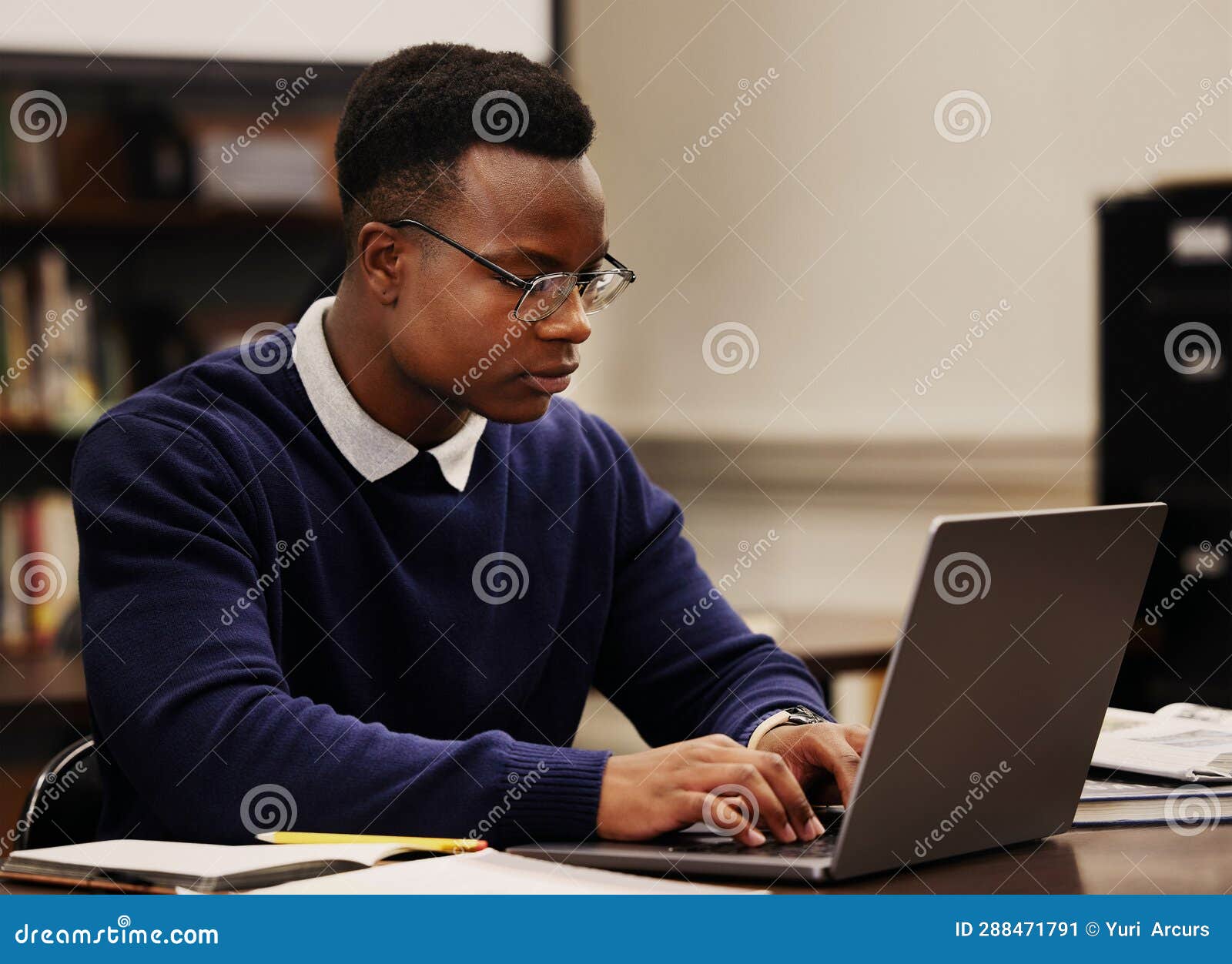 Student, Learning and Black Man Typing on a Laptop in University or ...