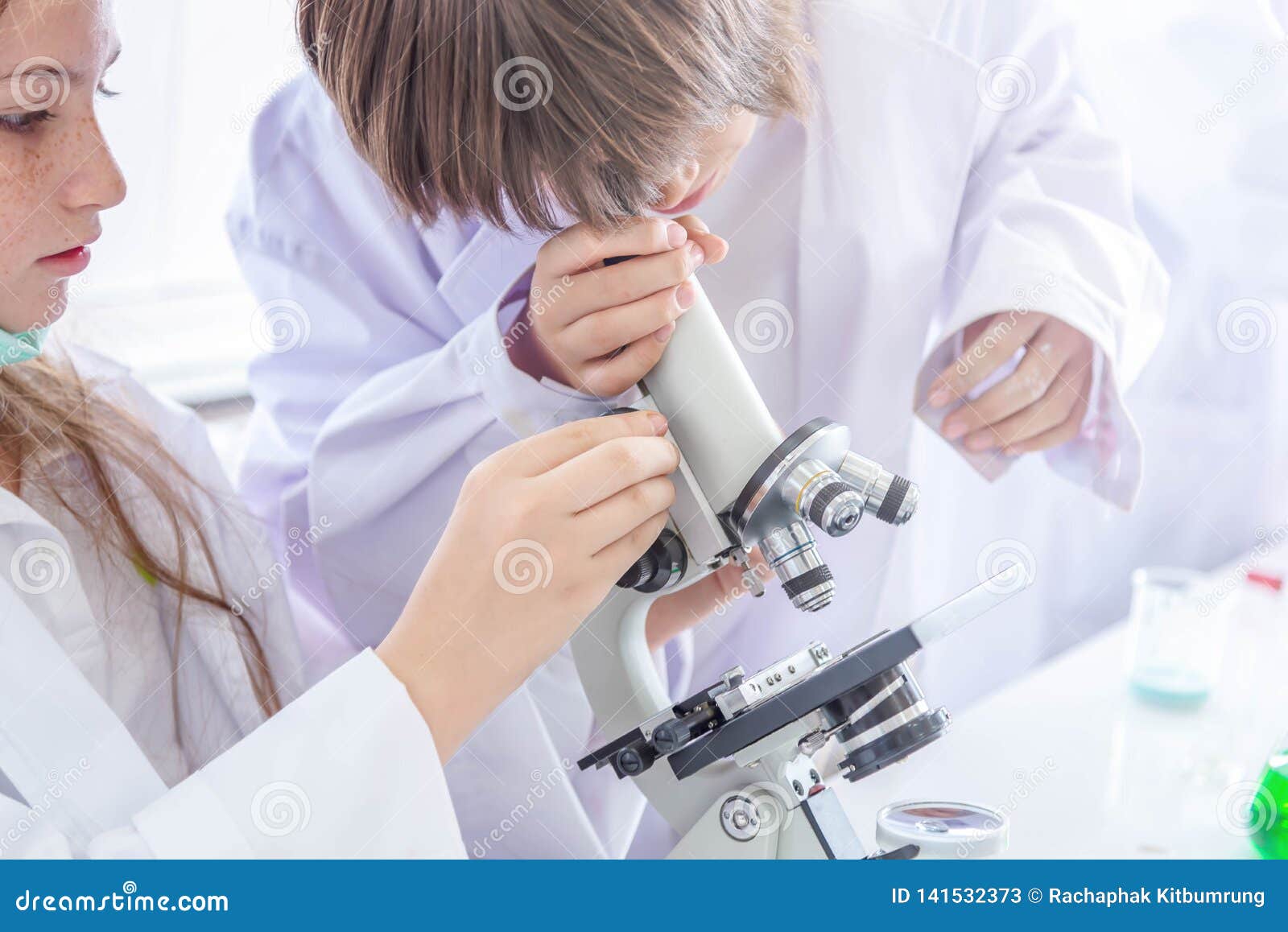 Student Learning Chemistry. Positive Joyful Smart Boy and Girl Tesing ...