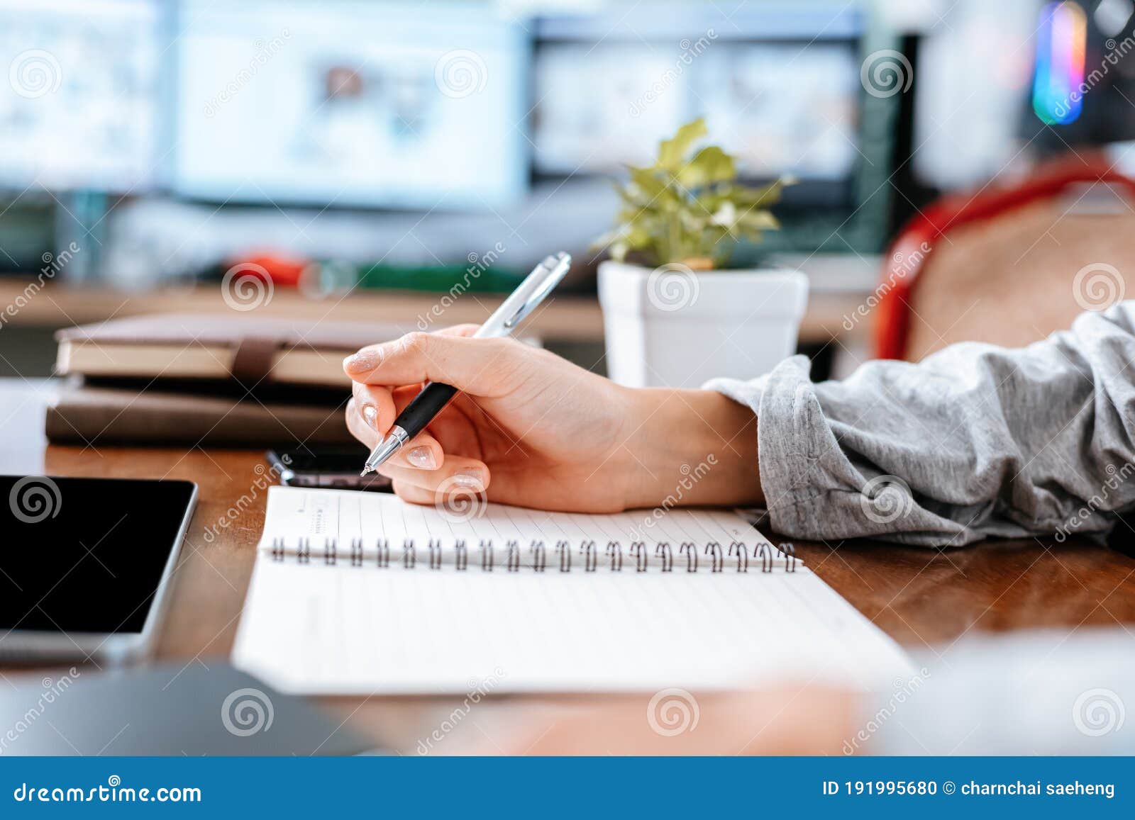 Student Learning and Hold Pen for Writing a Note. Student Learning at ...