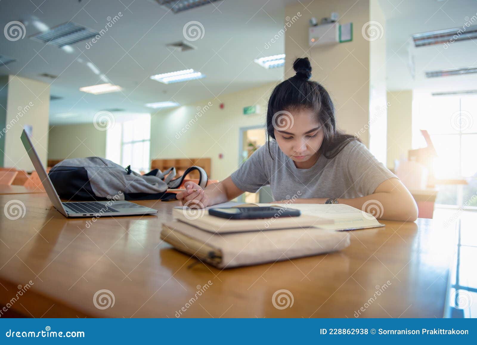Student Learning in the Library Stock Photo - Image of education, girl ...