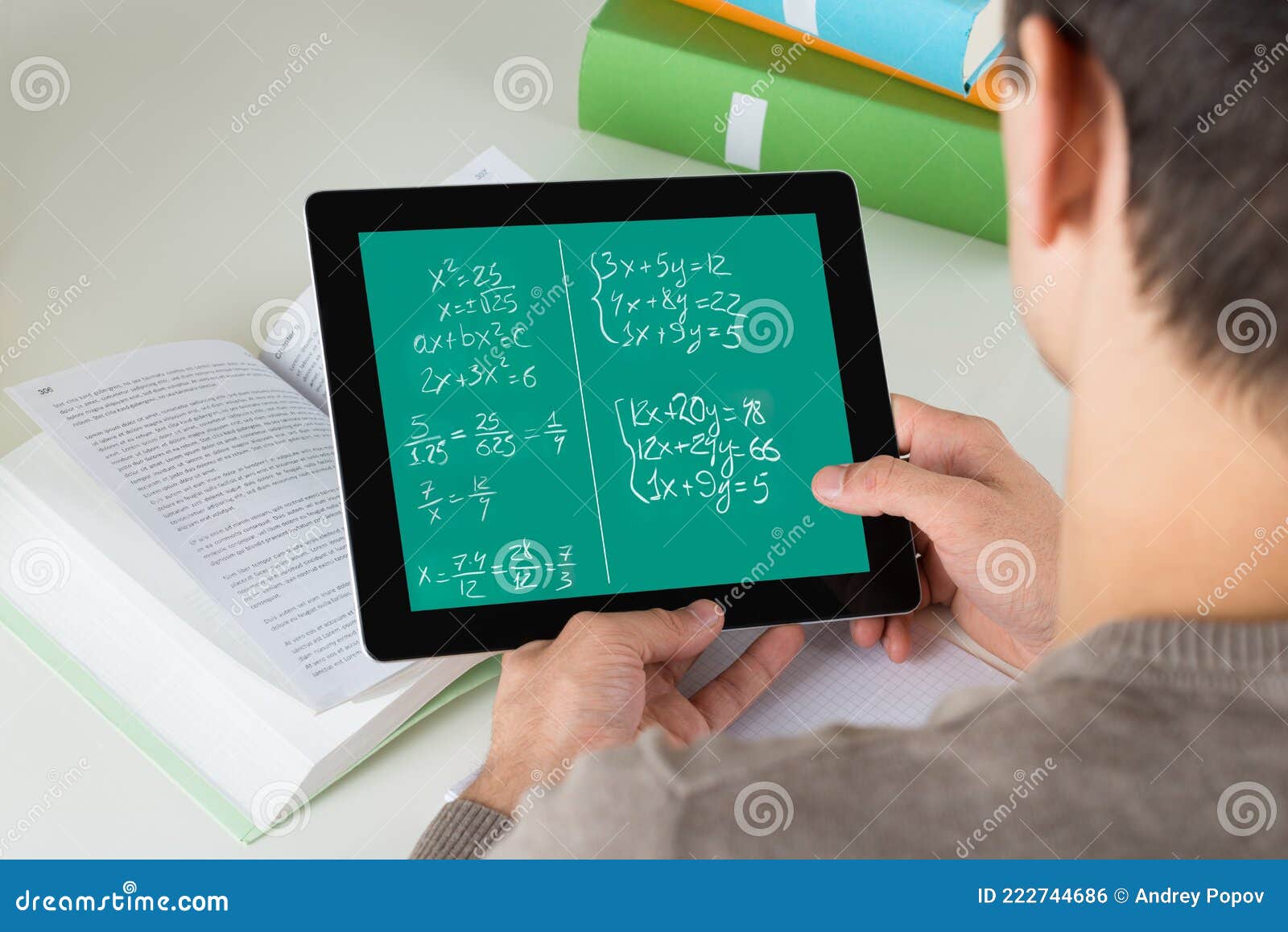 Student Learning Mathematical Equations on Digital Tablet Stock Photo ...
