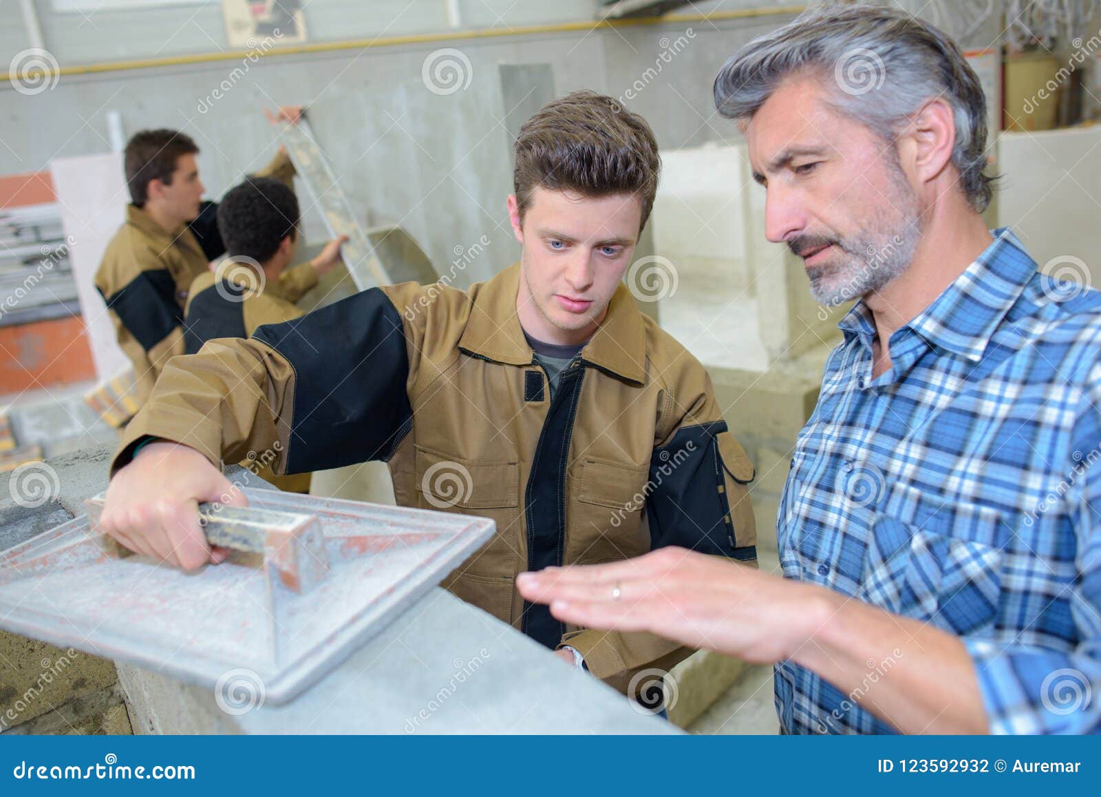 Student Learning To Float Cement Stock Photo - Image of skill, mason ...