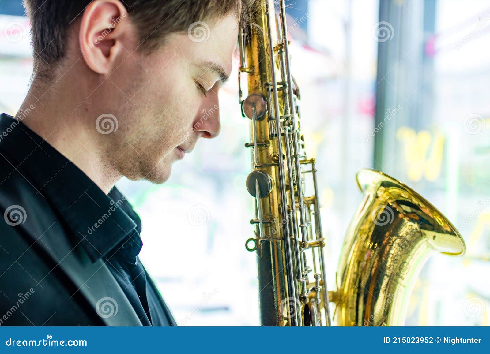 Student Learning To Play on Saxophone in the Room Stock Photo - Image ...