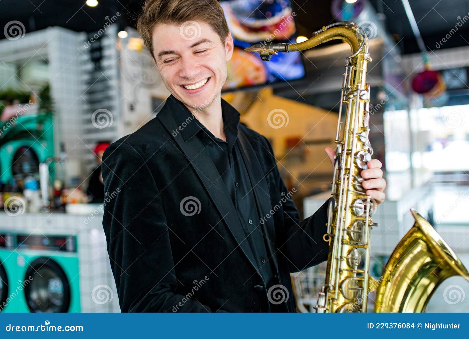 Student Learning To Play on Saxophone in the Room Stock Photo - Image ...